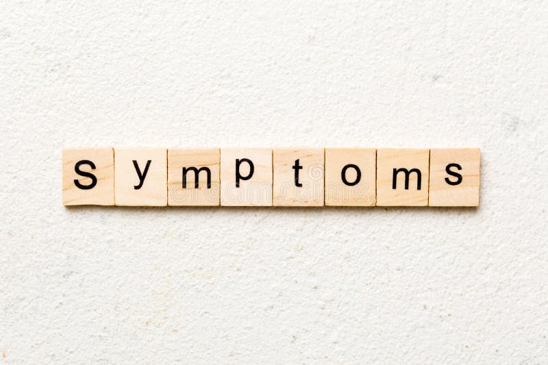 SYMPTOMS the Word on Wooden Cubes, Cubes Stand on a Reflective White ...