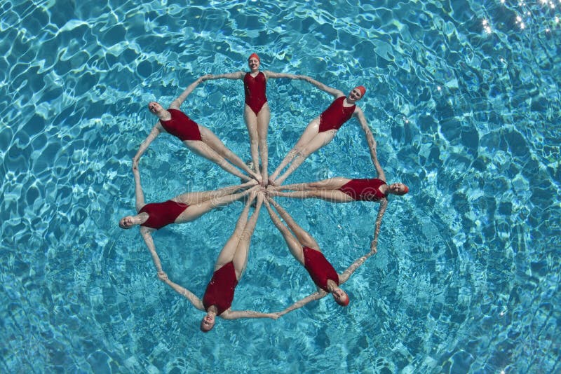 Synchronised Swimmers Forming a Circle Stock Image - Image of active ...