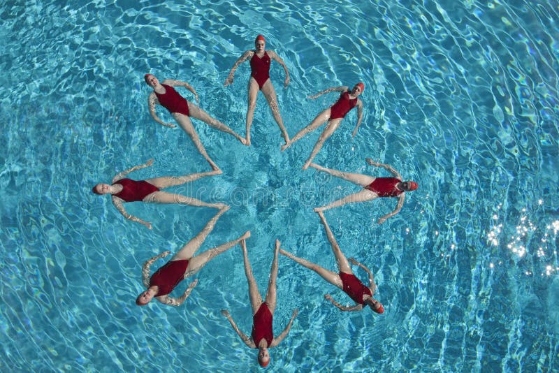 Synchronised Swimmers Forming a Star Shape Stock Image - Image of ...