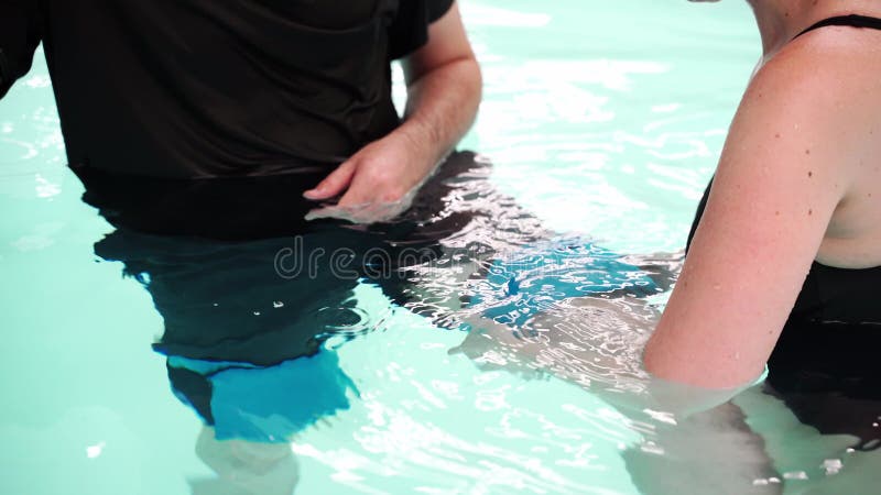 Synchronized Aquatic Workout Two People Performing Underwater Exercise ...