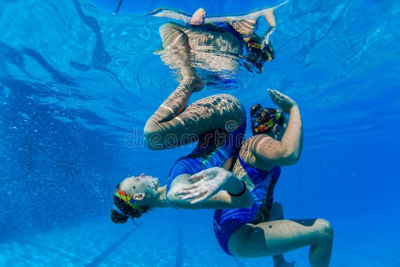 Synchronized Swim Pairs Underwater Editorial Image - Image of ... Synchronized Swim Pairs Underwater Editorial Image - Image of ...