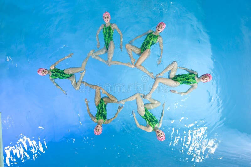 Synchronised Swimmers Forming a Circle Stock Image - Image of active ...