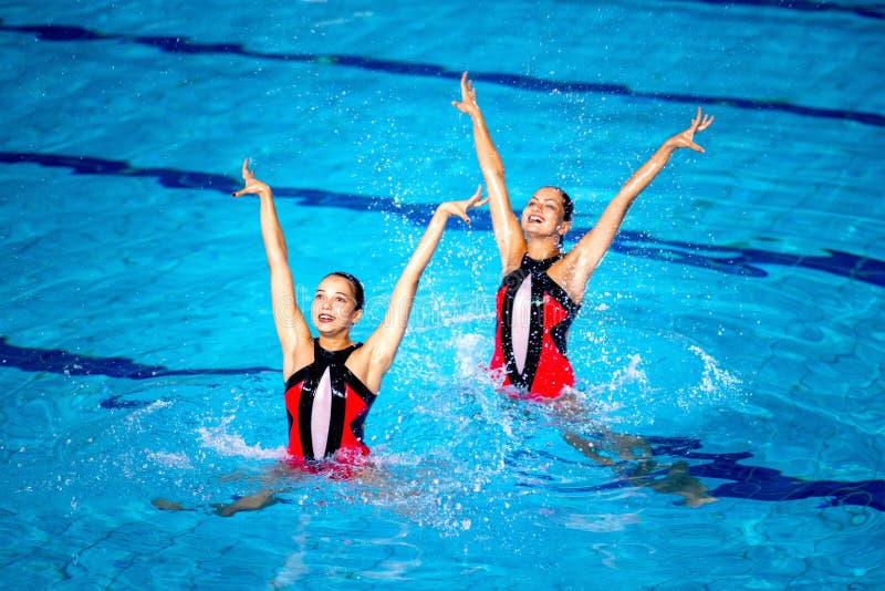 Synchronized Swimmers stock photo. Image of event, indoors - 222165586