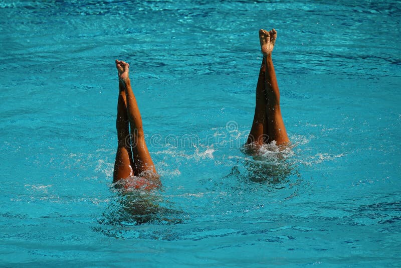 Synchronized Swimming Duet during Competition Stock Image - Image of ...