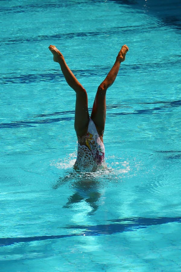 Synchronized Swimming Duet during Competition Stock Image - Image of ...