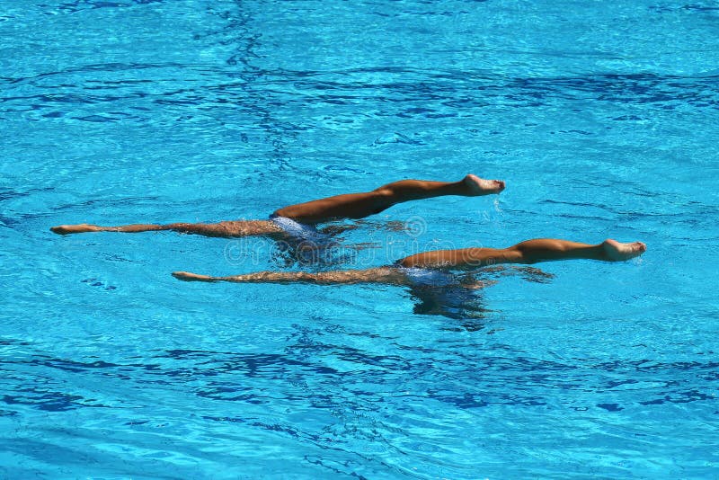 Synchronized Swimming Duet during Competition Stock Image - Image of ...