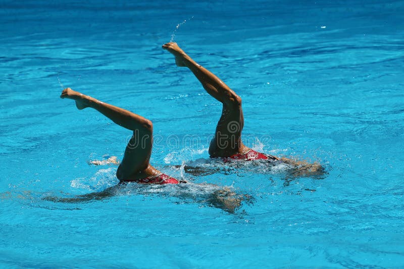 Synchronized Swimming Duet during Competition Editorial Photo - Image ...