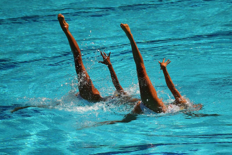 Synchronized Swimming Duet during Competition Stock Photo - Image of ...