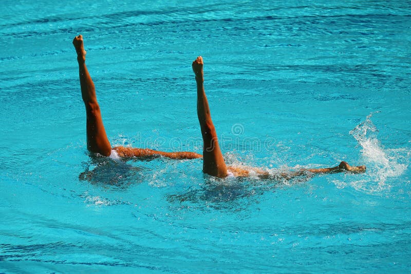 Synchronized Swimming Duet during Competition Stock Photo - Image of ...