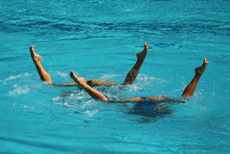 Synchronized Swimming Duet during Competition Stock Photo - Image of ...