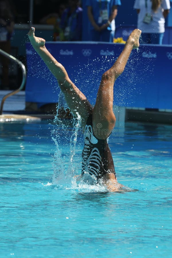 Synchronized Swimming Duet During Competition Stock Photo - Image of ...