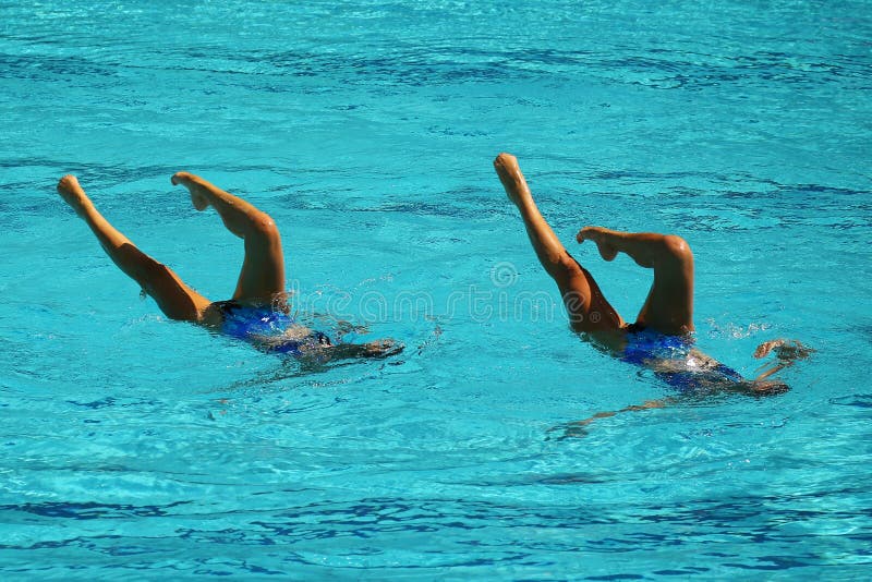 Synchronized Swimming Duet during Competition Stock Photo - Image of ...