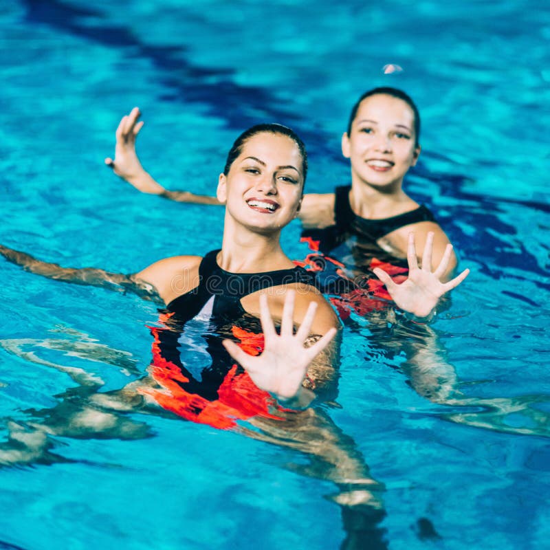 Synchronized Swimming Duet Underwater Stock Image - Image of elegance ...