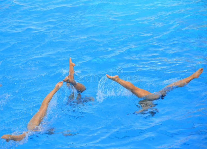 Synchronized swimming stock image. Image of coordinated - 68078025