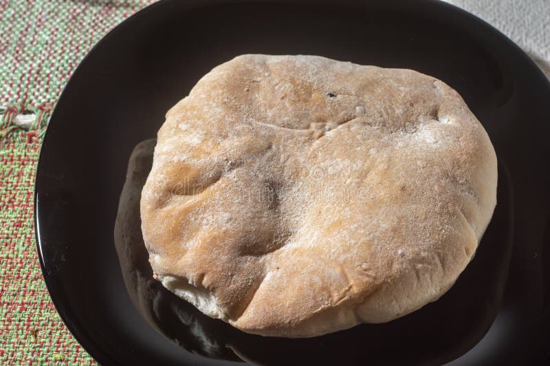 Syrian Bread on a Dish with Copy Space Left and Natural Light Stock ...