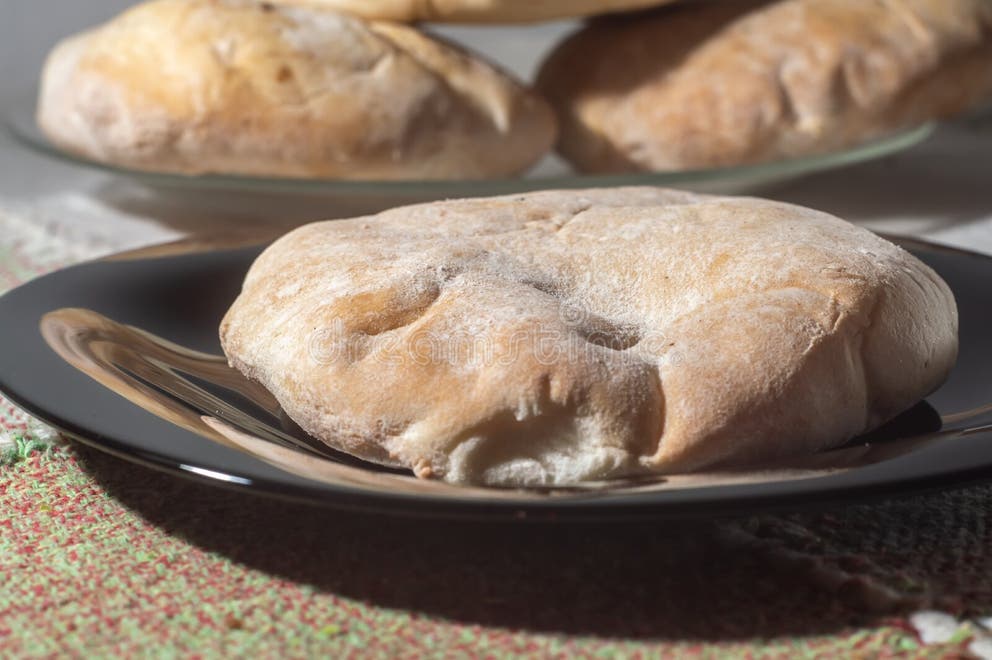Syrian Bread on a Dish with Copy Space Left and Natural Light Stock ...