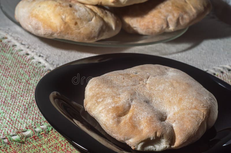 Syrian Bread on a Dish with Copy Space Left and Natural Light Stock ...