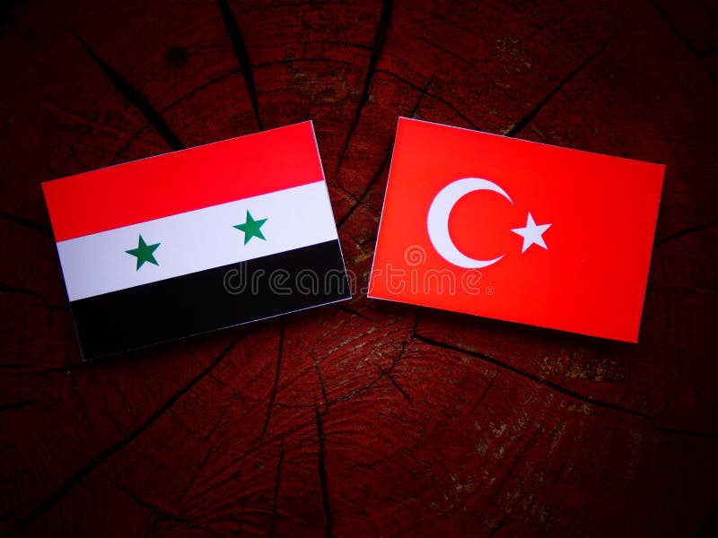Syrian Flag with Turkish Flag on a Tree Stump Stock Photo - Image of ...