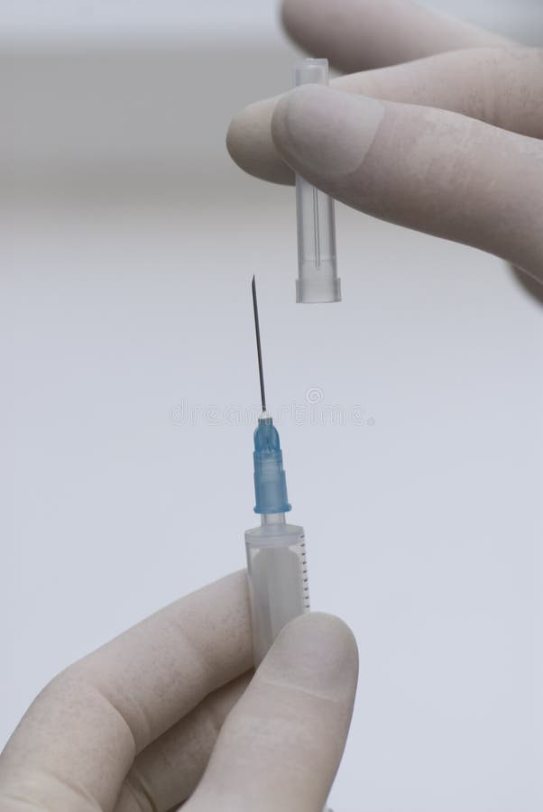 Syringe stock image. Image of medicative, fingers, intramuscular - 2930465
