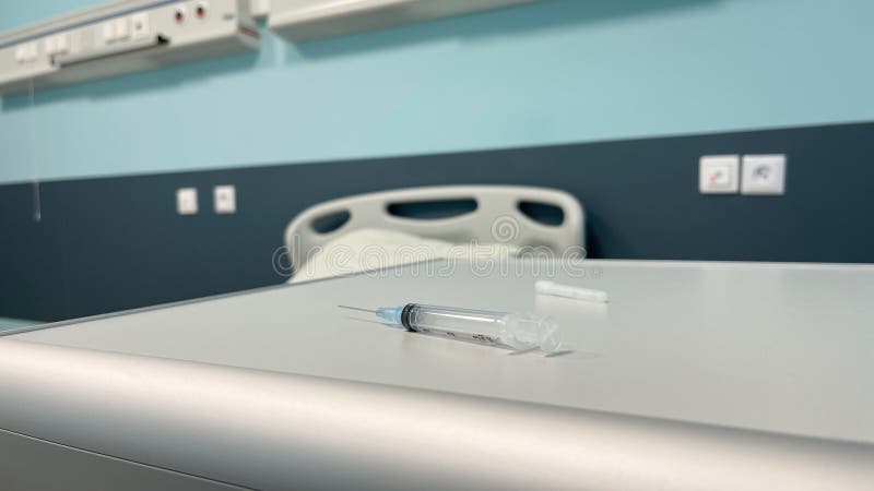 The Syringe is on the Bedside Table Stock Photo - Image of ...