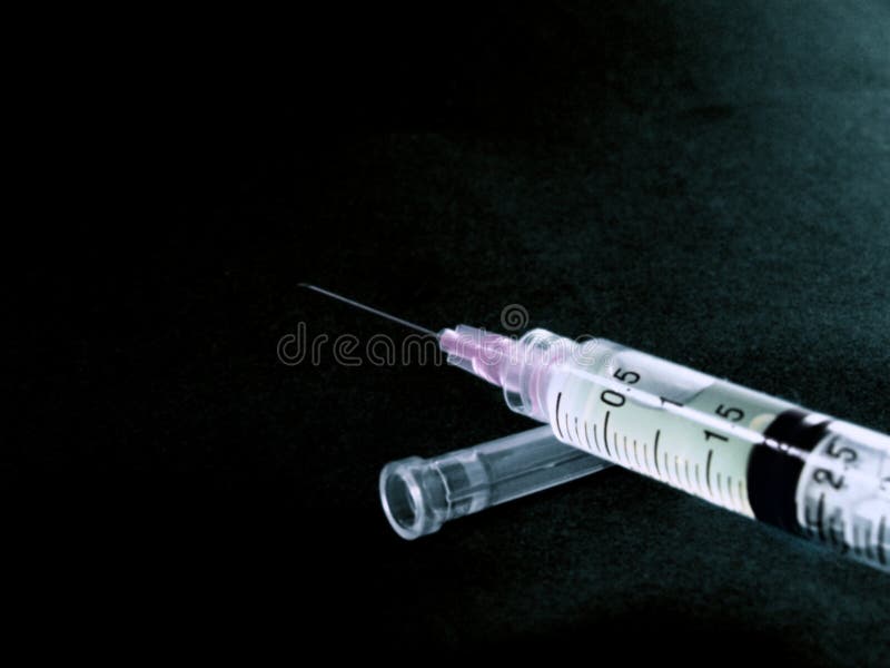 Syringe on black stock image. Image of utensil, health - 4891691