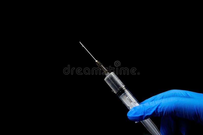 A Syringe on a Black Background. Stock Photo - Image of syringe, still ...