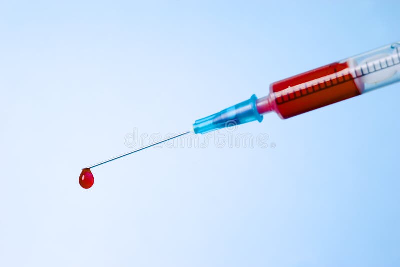 Syringe With A Blood Sample. A Drop Of Blood At The End Of The Needle ...