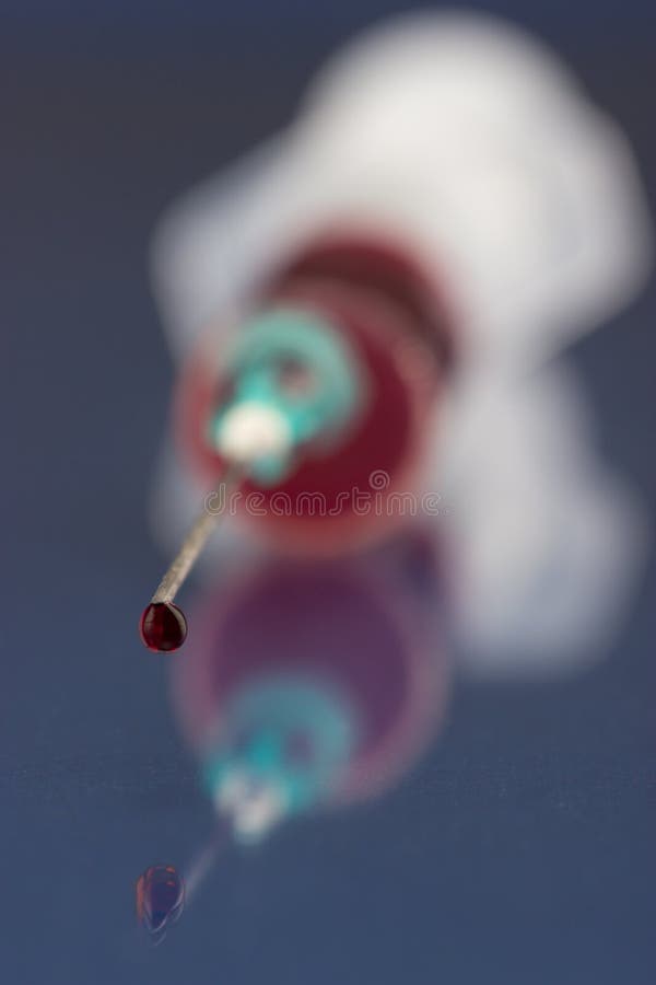 Syringe with Blood on Blue Background Stock Photo - Image of fear ...