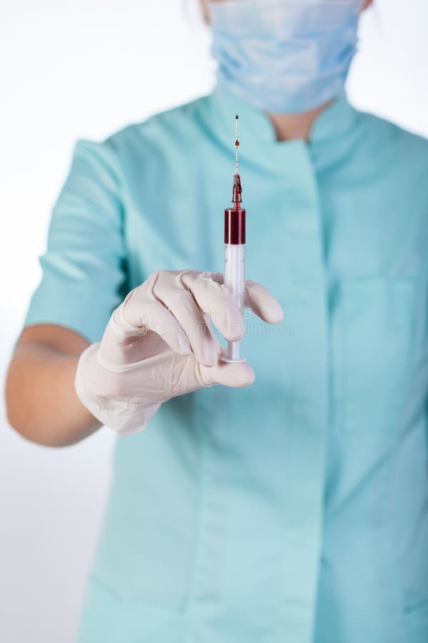 Syringe with blood sample stock photo. Image of protective - 45771754