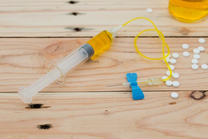 Syringe and Blue needle stock image. Image of pharmaceutical - 75383723