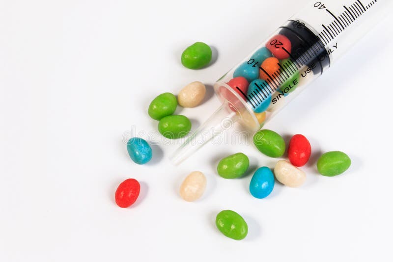 A Syringe and Candy Bottle. Stock Photo - Image of diabetes, huge: 69009346