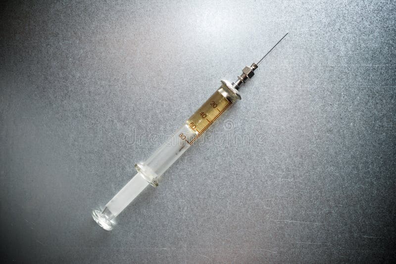 Close-up Syringe Filled With Liquid With Air Bubbles. Inscription ...