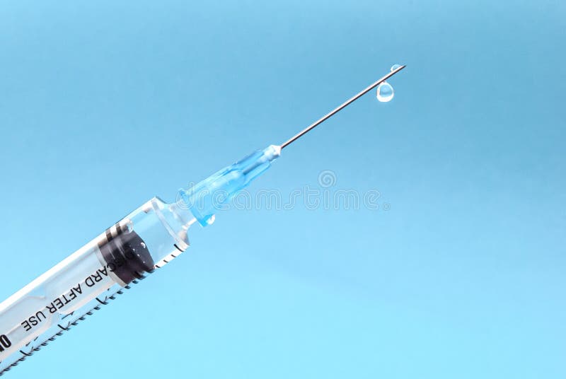 Syringe with Drop and Figurine Stock Image - Image of needle, drops ...