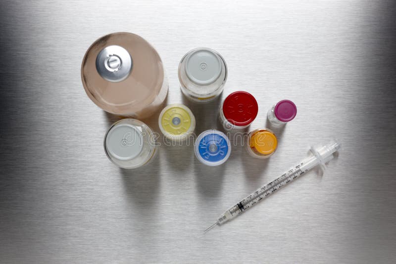 Syringe with drug bottles stock photo. Image of serum - 8160706