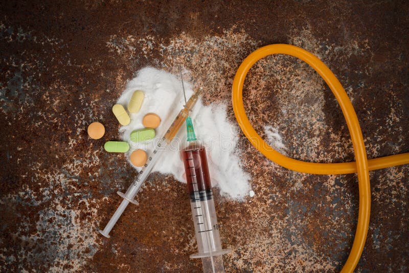 Syringe and Drugs on Dirty Rusty Background. Injection Syringe Stock ...