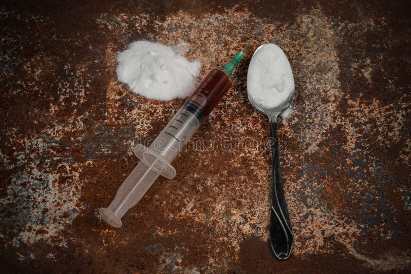 Syringe and Drugs on Dirty Rusty Background. Injection Syringe Stock ...
