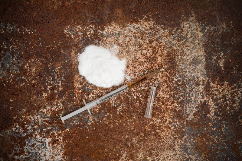 Syringe and Drugs on Dirty Rusty Background. Injection Syringe Stock ...