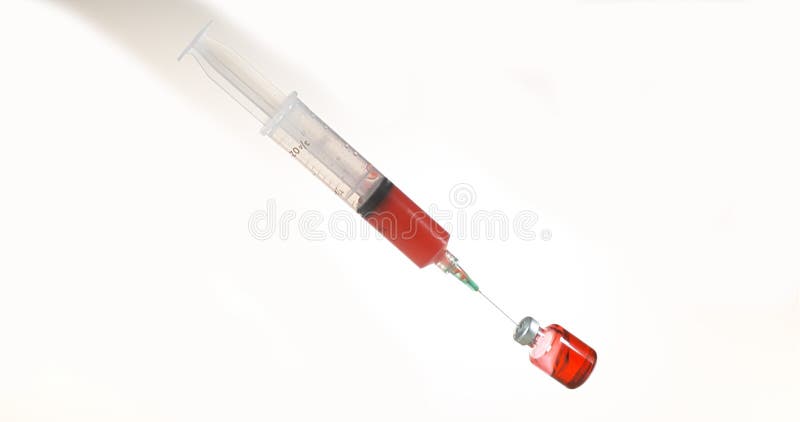 Syringe Falling Against White Background Stock Photo - Image of ...