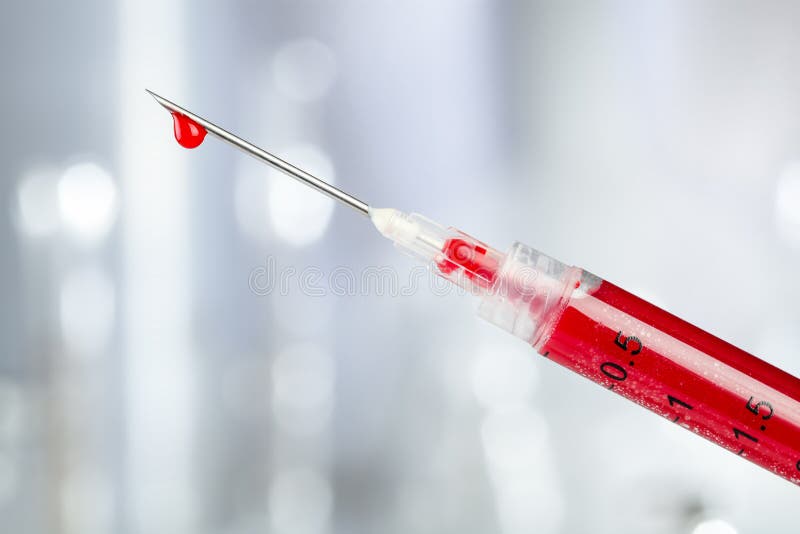 Syringe And Needle Filled With Blood Stock Photo - Image of injection ...