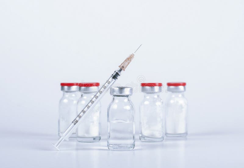 Syringe and Glass Vials with Medicine for Injection Close-up Stock ...