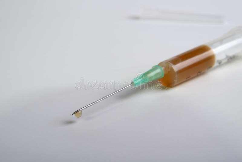 Medical Syringe Brown Liquid Solution Stock Photos - Free & Royalty ...