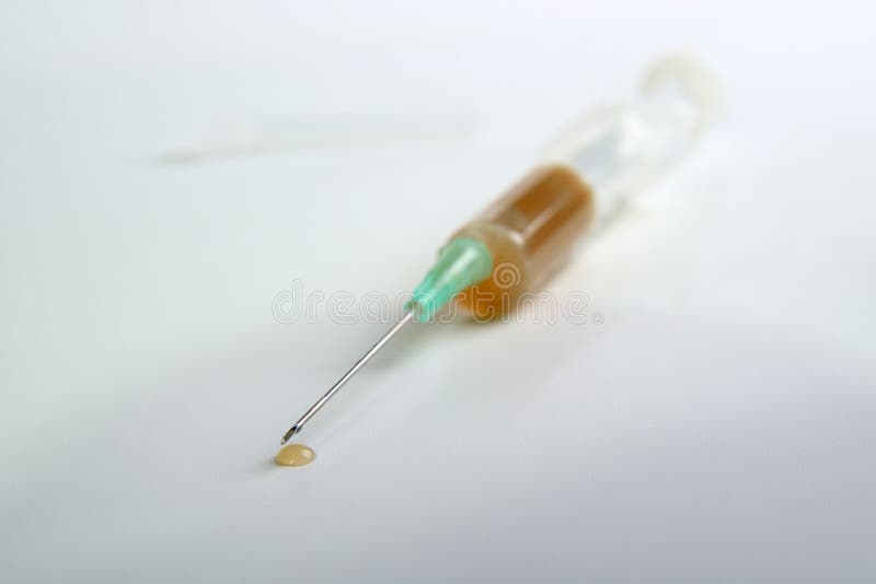 Medical Syringe Brown Liquid Solution Stock Photos - Free & Royalty ...