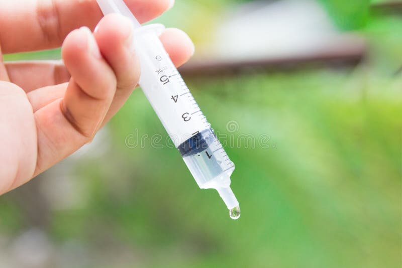 Syringe Injection Test with Water Stock Photo - Image of chemistry ...