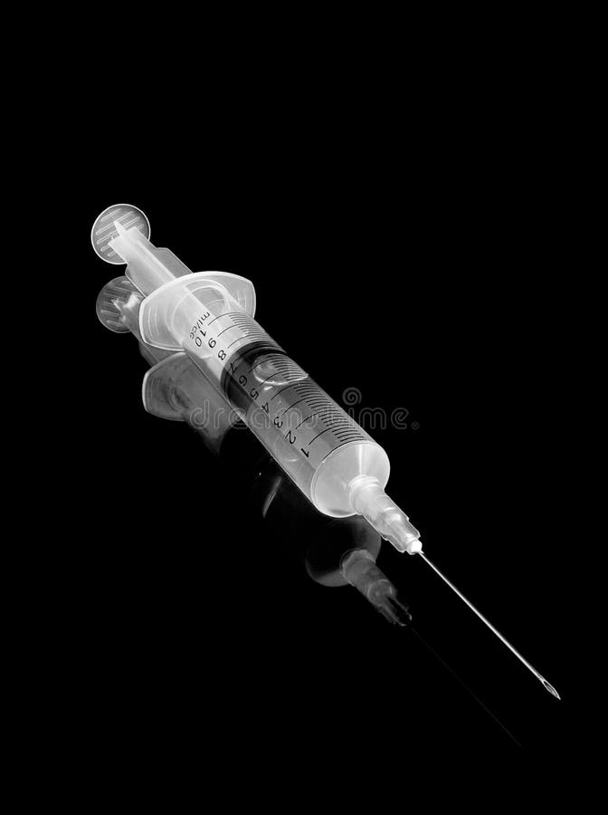 Syringe for Injections on a Black Background. Stock Photo - Image of ...