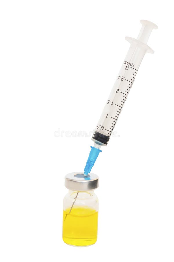 Syringe with yellow liquid stock photo. Image of instrument - 12845220