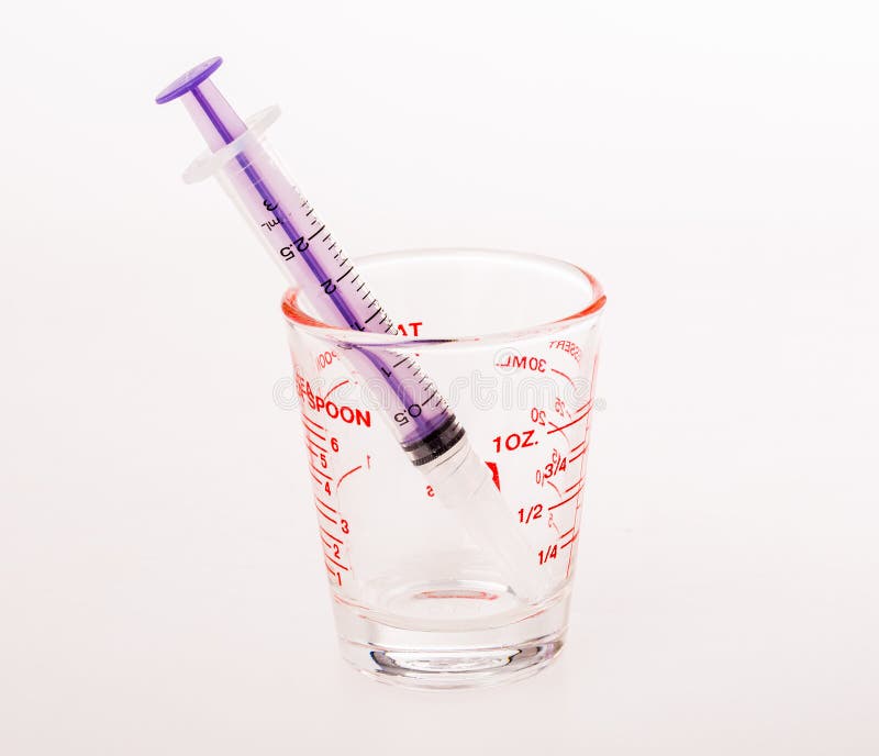 Measuring a Hypodermic Needle Stock Photo - Image of millimetres, small ...