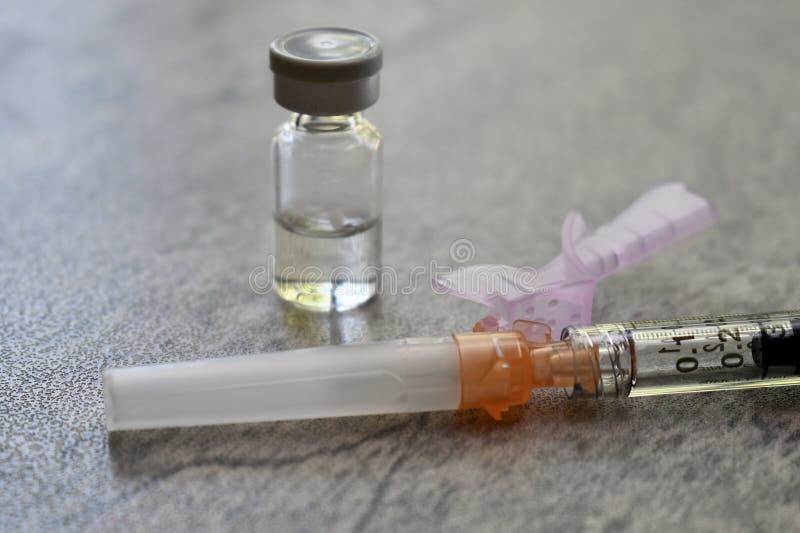 Syringe and medicine vial stock photo. Image of vaccine - 285603702