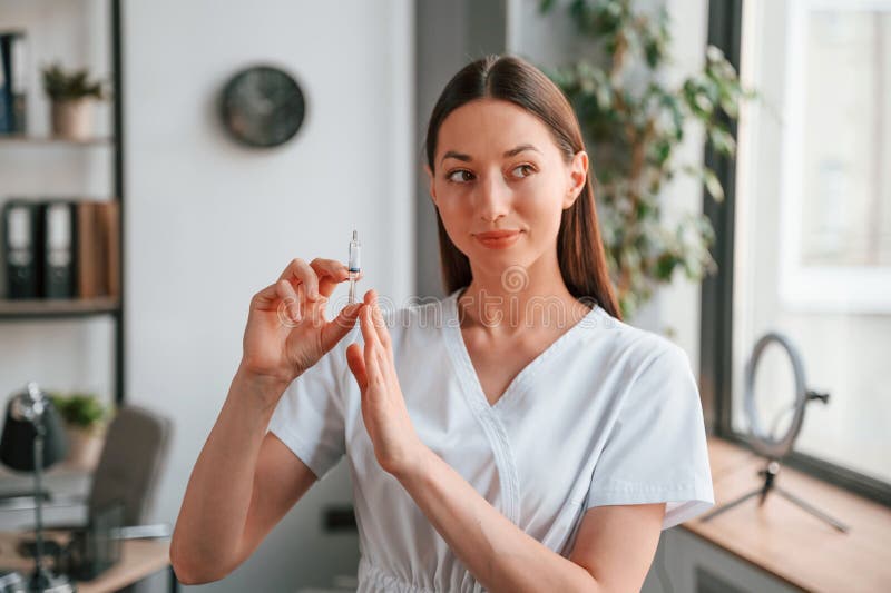 Syringe With Medicine Young Beautiful Female Doctor In White Coat Is