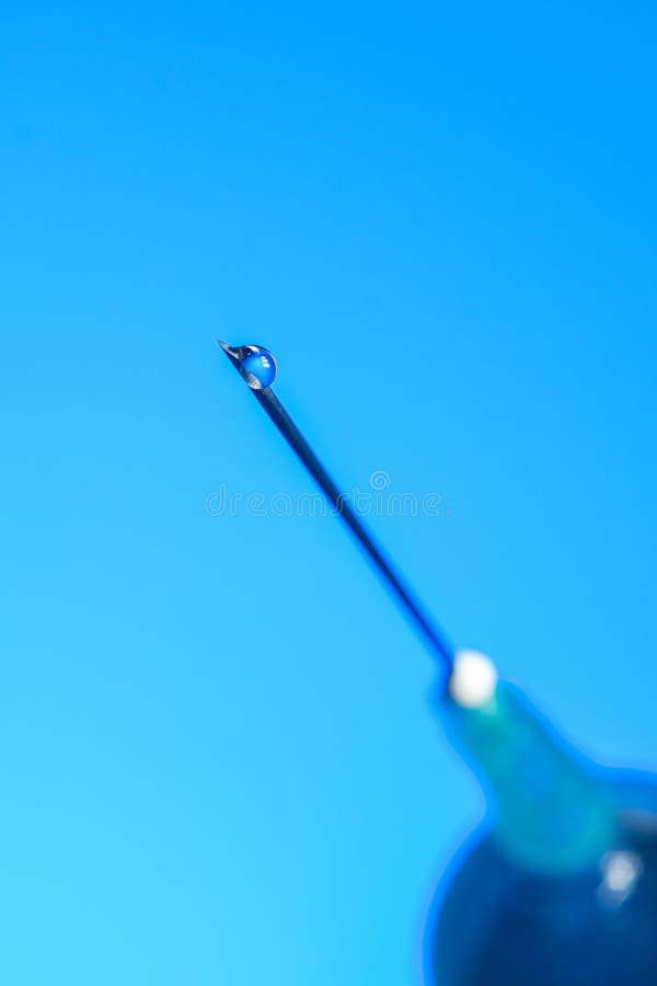Syringe Needle with Liquid Drop on the Tip Macro Close Up Isolated on ...