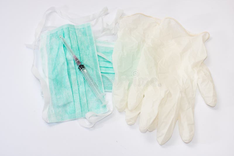 Syringe and Needle on Surgical Mask and Gloves Stock Image - Image of ...